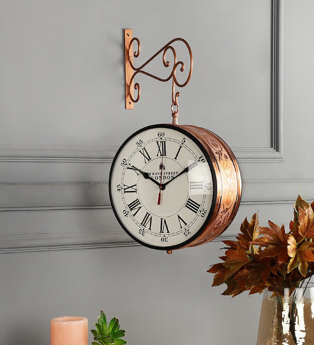 Buy Copper Metallic Carving Station Clock at 32% OFF by Exim Decor ...