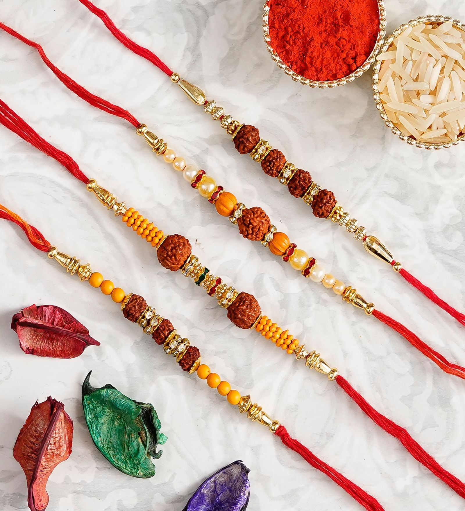 Buy Set of 4 Designer Rudraksha Rakhis with Roli Chawal Pack at 66% OFF ...